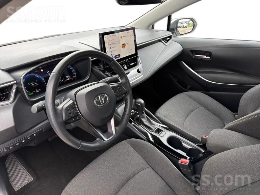 Balts Toyota Corolla 2024 Rīga, ar dzinēja tilpumu 1.80 L un nobraukumu 20 tūkst. km par 23590 €, foto 12 vietnē AUTOMOTO.COM.LV