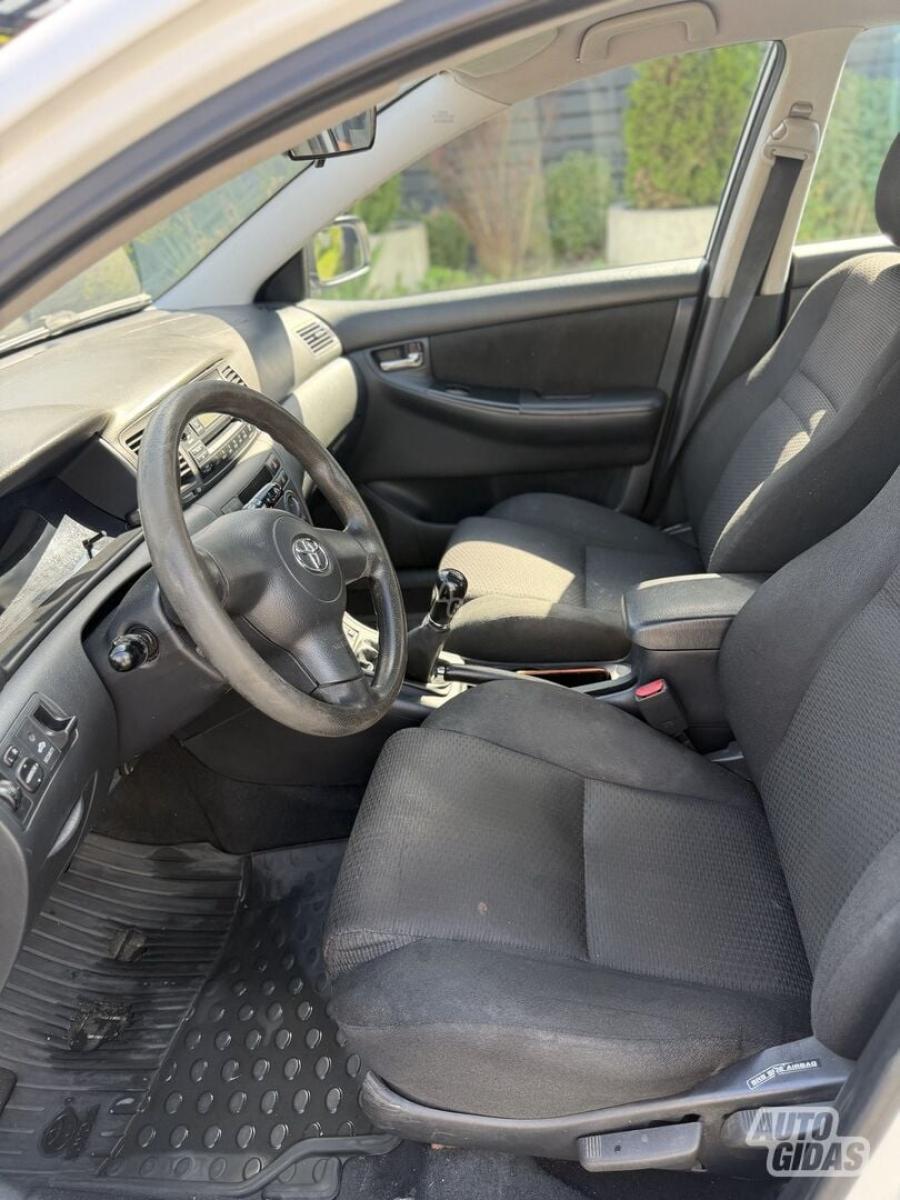 Balts Toyota Corolla 2006 Kauņa, ar dzinēja tilpumu 1.60 L un nobraukumu 275 tūkst. km par 2200 €, foto 13 vietnē AUTOMOTO.COM.LV