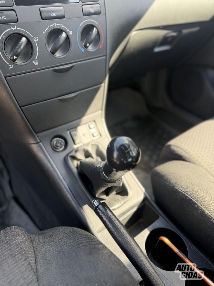 Balts Toyota Corolla 2006 Kauņa, ar dzinēja tilpumu 1.60 L un nobraukumu 275 tūkst. km par 2200 €, foto 18 vietnē AUTOMOTO.COM.LV