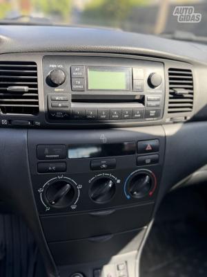 Balts Toyota Corolla 2006 Kauņa, ar dzinēja tilpumu 1.60 L un nobraukumu 275 tūkst. km par 2200 €, foto 19 vietnē AUTOMOTO.COM.LV