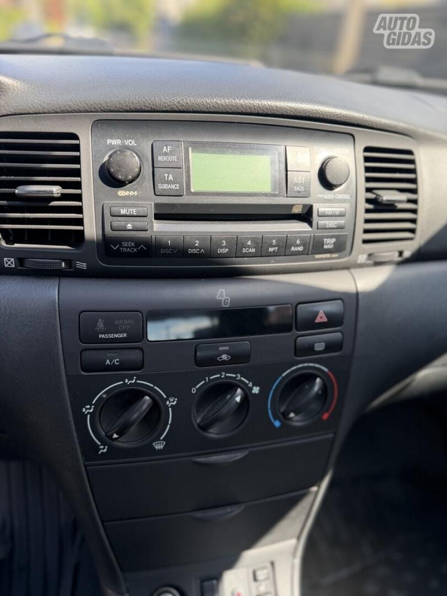 Balts Toyota Corolla 2006 Kauņa, ar dzinēja tilpumu 1.60 L un nobraukumu 275 tūkst. km par 2200 €, foto 19 vietnē AUTOMOTO.COM.LV