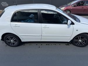 White Toyota Corolla 2006 in Kaunas, with an engine capacity of 1.60 L and mileage of 275 thousand km for 2200 €, photo 6 on AUTOMOTO.COM.LV