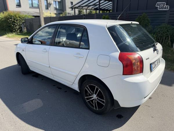 White Toyota Corolla 2006 in Kaunas, with an engine capacity of 1.60 L and mileage of 275 thousand km for 2200 €, photo 9 on AUTOMOTO.COM.LV