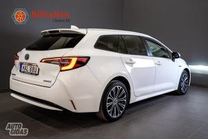 White Toyota Corolla 2019 in Kaunas, with an engine capacity of 0.00 L and mileage of 52 thousand km for 23418 €, photo 2 on AUTOMOTO.COM.LV