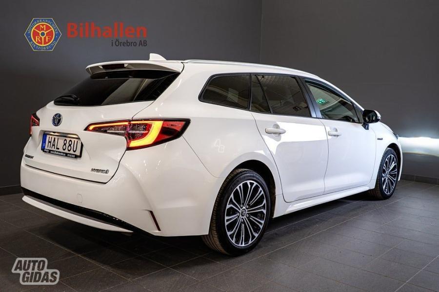White Toyota Corolla 2019 in Kaunas, with an engine capacity of 0.00 L and mileage of 52 thousand km for 23418 €, photo 2 on AUTOMOTO.COM.LV