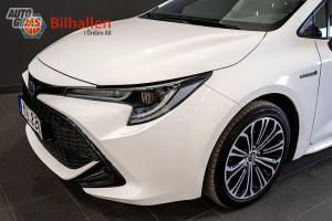 White Toyota Corolla 2019 in Kaunas, with an engine capacity of 0.00 L and mileage of 52 thousand km for 23418 €, photo 3 on AUTOMOTO.COM.LV