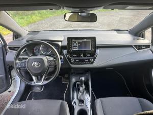 White Toyota Corolla 2020 in Tallinn, with an engine capacity of 1.80 L and mileage of 128 thousand km for 16000 €, photo 14 on AUTOMOTO.COM.LV