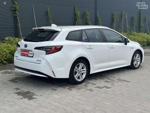 White Toyota Corolla 2021 in Vilnius, with an engine capacity of 1.80 L and mileage of 225 thousand km for 15250 €, photo 6 on AUTOMOTO.COM.LV