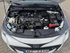 White Toyota Corolla 2021 in Riga, with an engine capacity of 1.80 L and mileage of 100 thousand km for 18500 €, photo 23 on AUTOMOTO.COM.LV