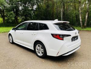 White Toyota Corolla 2021 in Riga, with an engine capacity of 1.20 L and mileage of 0 thousand km for 9750 €, photo 5 on AUTOMOTO.COM.LV