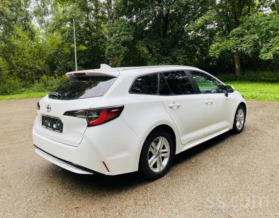 White Toyota Corolla 2021 in Riga, with an engine capacity of 1.20 L and mileage of 0 thousand km for 9750 €, photo 6 on AUTOMOTO.COM.LV