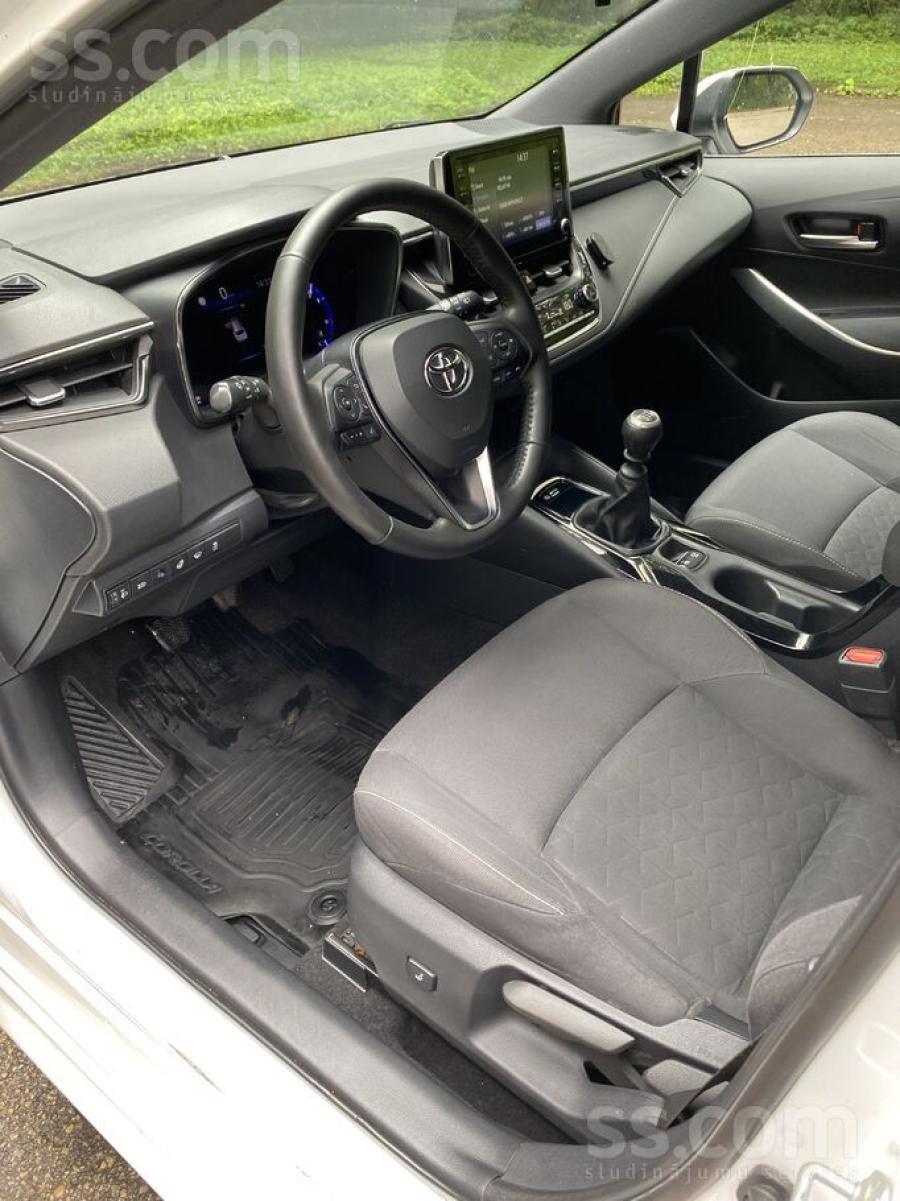 White Toyota Corolla 2021 in Riga, with an engine capacity of 1.20 L and mileage of 0 thousand km for 9750 €, photo 7 on AUTOMOTO.COM.LV