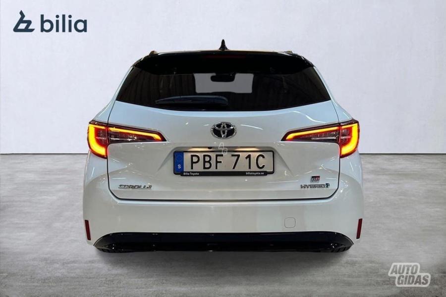 White Toyota Corolla 2022 in Kaunas, with an engine capacity of 0.00 L and mileage of 48 thousand km for 29919 €, photo 6 on AUTOMOTO.COM.LV