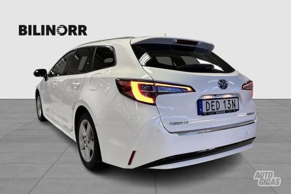 White Toyota Corolla 2022 in Kaunas, with an engine capacity of 0.00 L and mileage of 84 thousand km for 25380 €, photo 3 on AUTOMOTO.COM.LV