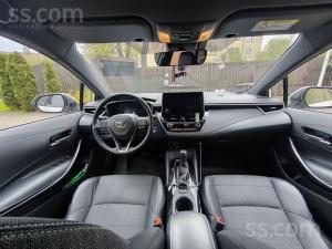 White Toyota Corolla 2022 in Riga, with an engine capacity of 1.80 L and mileage of 89 thousand km for 20750 €, photo 6 on AUTOMOTO.COM.LV