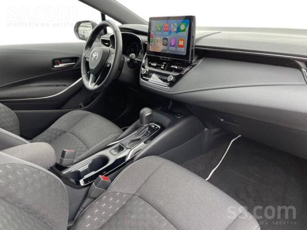 White Toyota Corolla 2023 in Riga, with an engine capacity of 1.80 L and mileage of 67 thousand km for 22990 €, photo 6 on AUTOMOTO.COM.LV