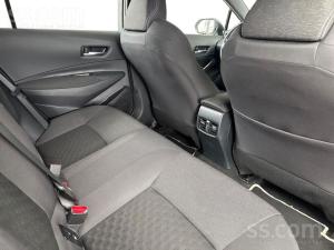 White Toyota Corolla 2023 in Riga, with an engine capacity of 1.80 L and mileage of 73 thousand km for 22990 €, photo 8 on AUTOMOTO.COM.LV