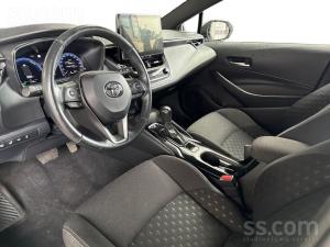 White Toyota Corolla 2023 in Riga, with an engine capacity of 1.80 L and mileage of 73 thousand km for 22990 €, photo 12 on AUTOMOTO.COM.LV