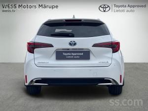 White Toyota Corolla 2024 in Riga, with an engine capacity of 1.80 L and mileage of 76 thousand km for 23990 €, photo 6 on AUTOMOTO.COM.LV