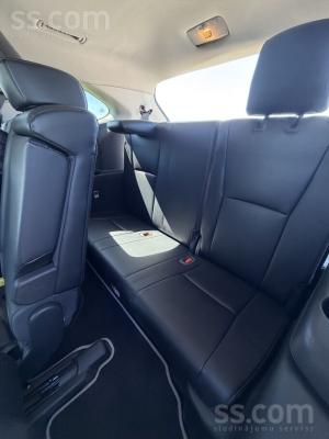 White Toyota Highlander 2021 in Riga, with an engine capacity of 2.50 L and mileage of 84 thousand km for 41900 €, photo 13 on AUTOMOTO.COM.LV