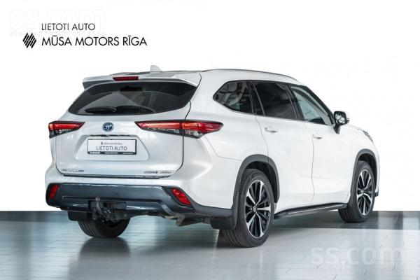 Toyota Highlander 2022 Rīga vietnē Balts Toyota Highlander 2022 Rīga, ar dzinēja tilpumu 2.50 L un nobraukumu 127 tūkst. km par 38000 €, foto 3 vietnē AUTOMOTO.COM.LV