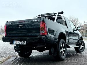 Black Toyota Hilux 2008 in Bauska, with an engine capacity of 2.50 L and mileage of 0 thousand km for 12200 €, photo 3 on AUTOMOTO.COM.LV