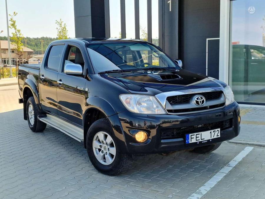 Melns Toyota Hilux 2010 Viļņa, ar dzinēja tilpumu 2.49 L un nobraukumu 185 tūkst. km par 10499 €, foto 1 vietnē AUTOMOTO.COM.LV