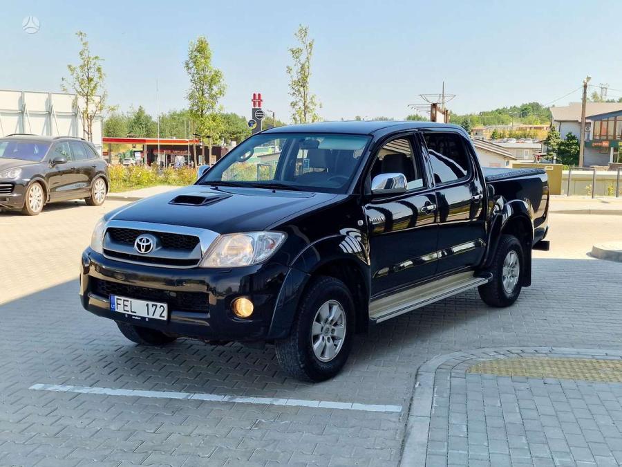 Melns Toyota Hilux 2010 Viļņa, ar dzinēja tilpumu 2.49 L un nobraukumu 185 tūkst. km par 10499 €, foto 4 vietnē AUTOMOTO.COM.LV