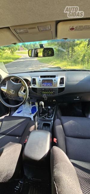 Melns Toyota Hilux 2016 Viļņa, ar dzinēja tilpumu 3.00 L un nobraukumu 225 tūkst. km par 18000 €, foto 19 vietnē AUTOMOTO.COM.LV