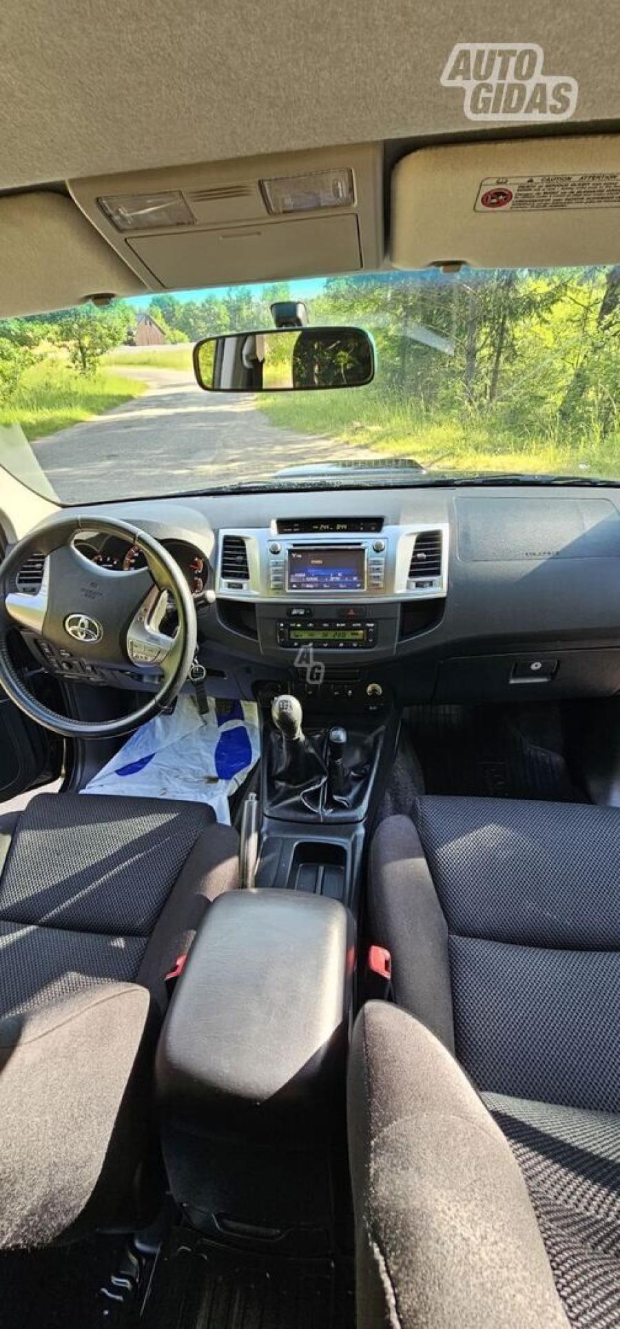 Melns Toyota Hilux 2016 Viļņa, ar dzinēja tilpumu 3.00 L un nobraukumu 225 tūkst. km par 18000 €, foto 19 vietnē AUTOMOTO.COM.LV
