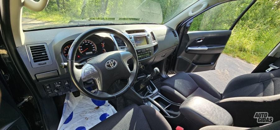 Melns Toyota Hilux 2016 Viļņa, ar dzinēja tilpumu 3.00 L un nobraukumu 225 tūkst. km par 18000 €, foto 26 vietnē AUTOMOTO.COM.LV