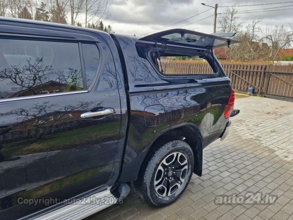 Black Toyota Hilux 2021 in Tallinn, with an engine capacity of 2.80 L and mileage of 70 thousand km for 44000 €, photo 6 on AUTOMOTO.COM.LV