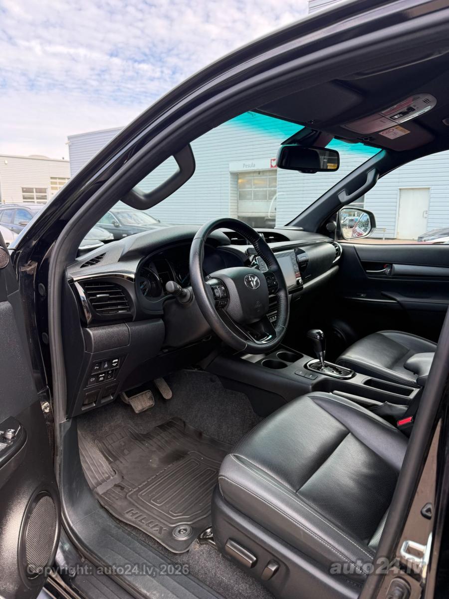 Black Toyota Hilux 2023 in Tallinn, with an engine capacity of 2.80 L and mileage of 105 thousand km for 54000 €, photo 6 on AUTOMOTO.COM.LV