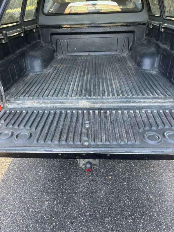 Melns Toyota Hilux 2011 Kaišiadorys, ar dzinēja tilpumu 2.98 L un nobraukumu 185 tūkst. km par 13600 €, foto 10 vietnē AUTOMOTO.COM.LV