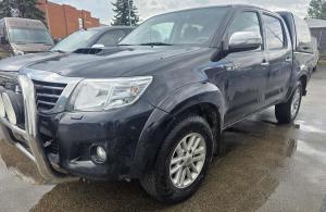 Black Toyota Hilux 2013 in Marijampole, with an engine capacity of 2.98 L and mileage of 250 thousand km for 11979 €, photo  on AUTOMOTO.COM.LV