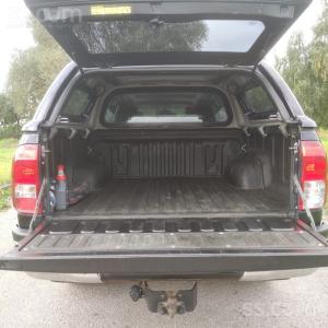 Black Toyota Hilux 2017 in Riga, with an engine capacity of 2.40 L and mileage of 155 thousand km for 20100 €, photo 9 on AUTOMOTO.COM.LV