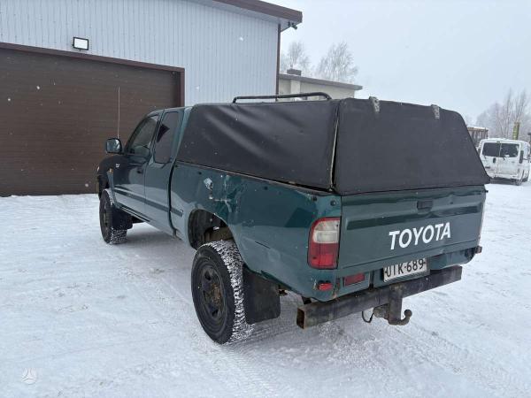 Green Toyota Hilux 1999 in Kelme, with an engine capacity of 2.44 L and mileage of 400 thousand km for 3750 €, photo 7 on AUTOMOTO.COM.LV