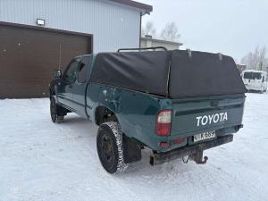 Green Toyota Hilux 1999 in Kelme, with an engine capacity of 2.44 L and mileage of 400 thousand km for 3750 €, photo 7 on AUTOMOTO.COM.LV