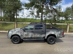 Green Toyota Hilux 2011 in Valka, with an engine capacity of 3.00 L and mileage of 280 thousand km for 13400 €, photo 4 on AUTOMOTO.COM.LV