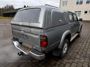 Grey Toyota Hilux 2004 in Haapsalu, with an engine capacity of 2.50 L and mileage of 303 thousand km for 9920 €, photo 3 on AUTOMOTO.COM.LV