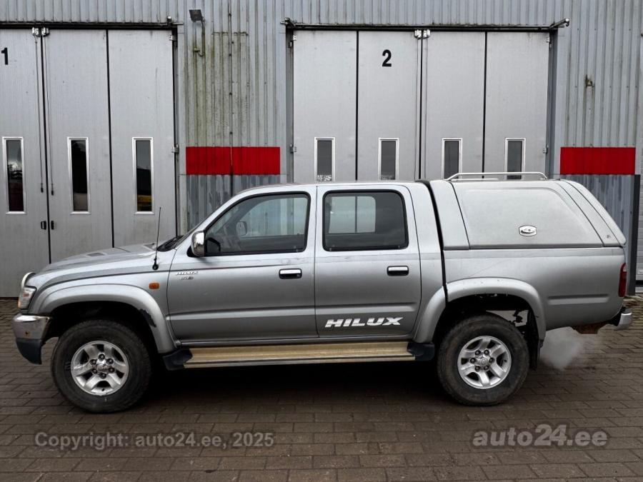 Grey Toyota Hilux 2004 in Haapsalu, with an engine capacity of 2.50 L and mileage of 303 thousand km for 9920 €, photo 4 on AUTOMOTO.COM.LV