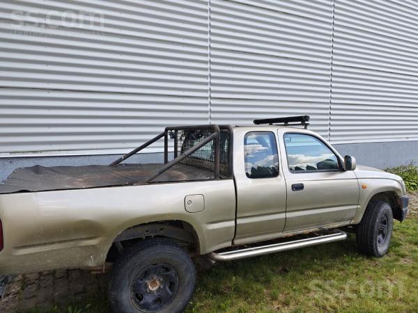 Grey Toyota Hilux 2003 in Jelgava, with an engine capacity of 2.50 L and mileage of 405 thousand km for 4500 €, photo 5 on AUTOMOTO.COM.LV