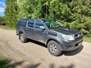 Grey Toyota Hilux 2011 in Riga, with an engine capacity of 2.50 L and mileage of 411 thousand km for 10000 €, photo  on AUTOMOTO.COM.LV