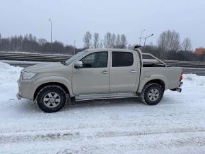 Grey Toyota Hilux 2013 in Vilnius, with an engine capacity of 2.49 L and mileage of 239 thousand km for 12700 €, photo 2 on AUTOMOTO.COM.LV