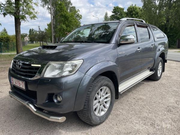 Grey Toyota Hilux 2013 in Riga, with an engine capacity of 3.00 L and mileage of 188 thousand km for 16890 €, photo 1 on AUTOMOTO.COM.LV
