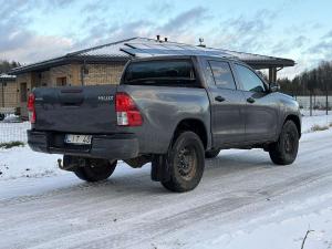 Grey Toyota Hilux 2019 in Vilnius, with an engine capacity of 2.39 L and mileage of 225 thousand km for 21400 €, photo 3 on AUTOMOTO.COM.LV