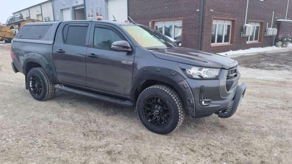 Grey Toyota Hilux 2022 in Siauliai, with an engine capacity of 2.39 L and mileage of 80 thousand km for 32500 €, photo 7 on AUTOMOTO.COM.LV
