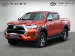 Orange Toyota Hilux 2022 in Riga, with an engine capacity of 1.80 L and mileage of 66 thousand km for 39990 €, photo  on AUTOMOTO.COM.LV