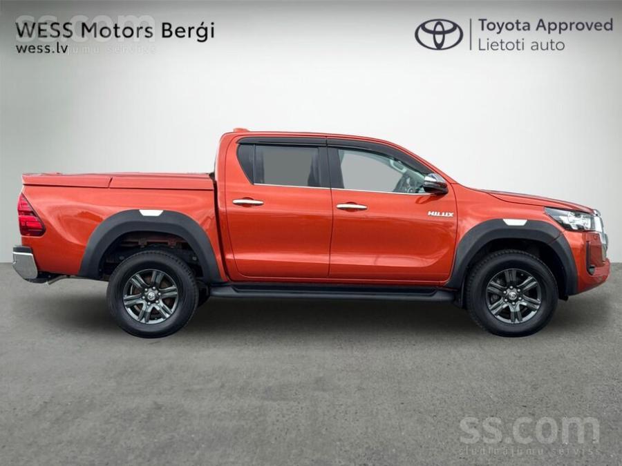Orange Toyota Hilux 2022 in Riga, with an engine capacity of 1.80 L and mileage of 66 thousand km for 39990 €, photo 25 on AUTOMOTO.COM.LV