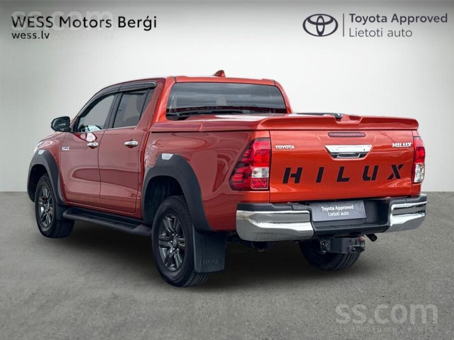 Orange Toyota Hilux 2022 in Riga, with an engine capacity of 1.80 L and mileage of 66 thousand km for 39990 €, photo 26 on AUTOMOTO.COM.LV